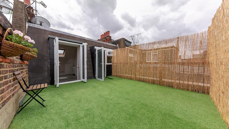 Property for sale in Comeragh Road, W14 featuring a balcony and a roof ...