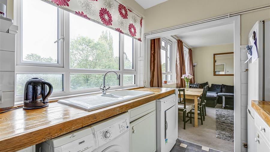 Flat for sale in Albert Drive, SW19 featuring a balcony and a lift (ref ...