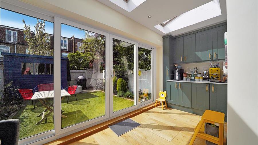 House for sale in Kirkley Road, SW19 featuring a garden (ref: 80403 ...